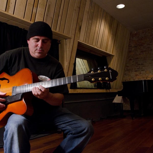 bio | SCOTT SAWYER | ...genre-busting guitar