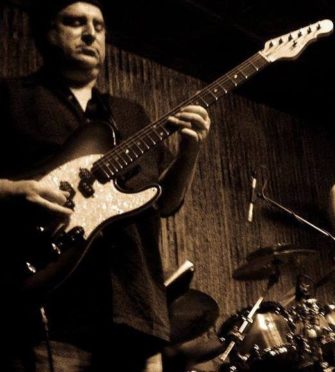 bio | SCOTT SAWYER | ...genre-busting guitar